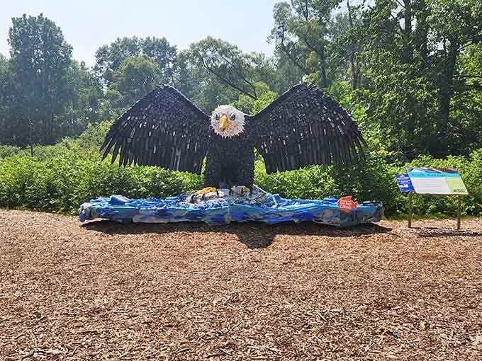 A bald eagle sculpture made from reclaimed materials spreads its wings wide, and somehow it feels completely earned.