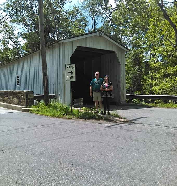 Two visitors pause at the entrance, and honestly, who could blame them for stopping to take it all in.