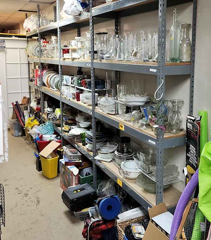 Rows of glassware, dishes, and kitchen pieces line these shelves, ready to upgrade your table setting on a very reasonable budget.