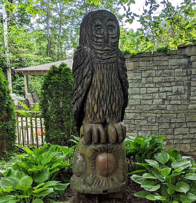 This hand-carved wooden owl perched among the hostas looks like it's been watching over this park since the beginning of time.