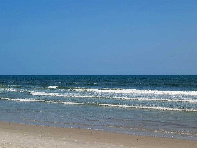 Gentle waves roll in with the kind of rhythm that makes you wonder why you ever needed meditation apps.