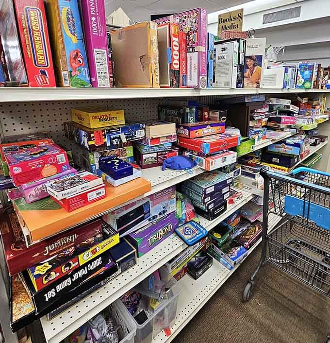 Jumanji, Clue, Trivial Pursuit, and a poker set all stacked together, one shelf holding enough entertainment for an entire rainy Minnesota weekend.