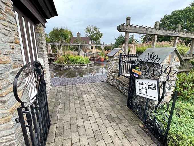 The Garden Caf&eacute; patio, framed by stone walls and pergolas, is where good days get even better.