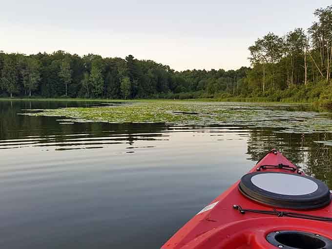 Gliding across a glassy lake at dusk in a kayak. Thoreau would have approved wholeheartedly.