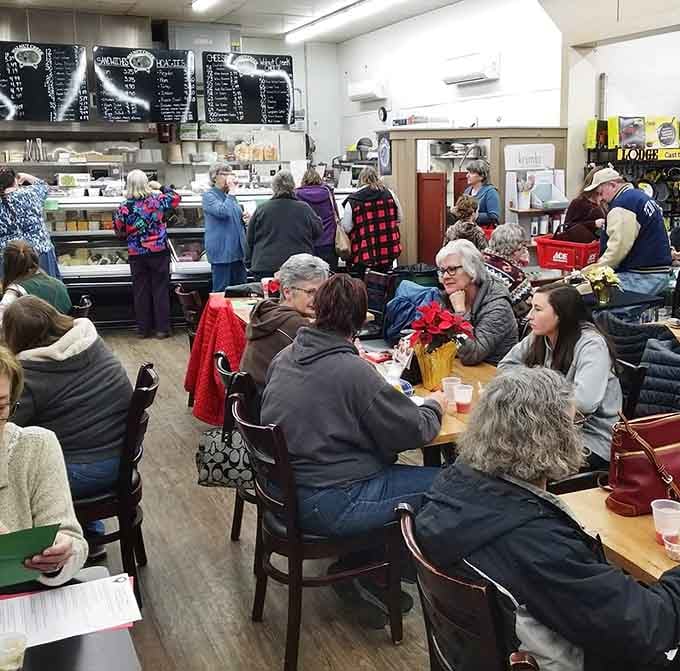A packed dining area full of happy customers, proof that good food brings people together better than anything else.