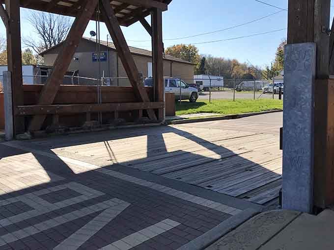 The wooden deck has carried countless footsteps across Cowles Creek. Every plank has a story worth standing on.