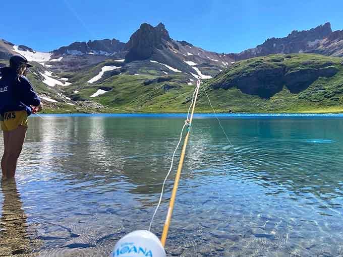 Fishing a line across water this clear and turquoise feels less like a sport and more like a dream you forgot to wake up from.