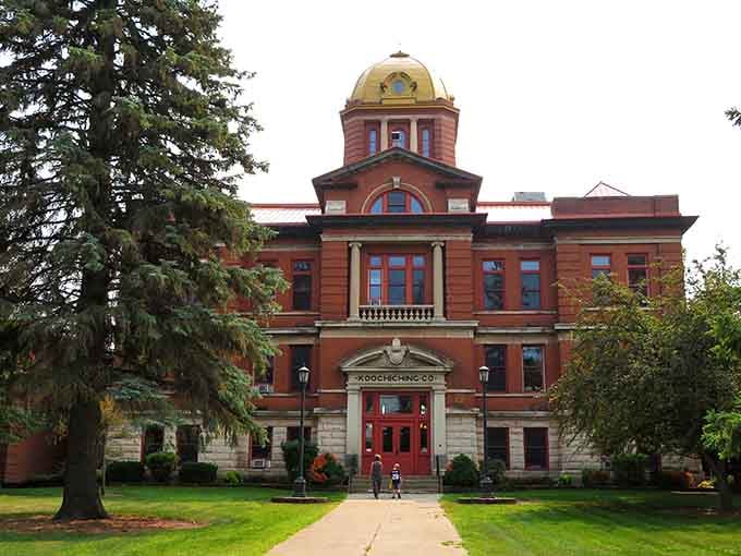 The courthouse stands as an architectural gem, reminding everyone that even small towns deserve buildings with dignity.