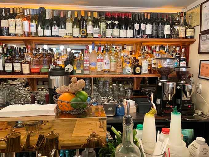 Rows of bottles, fresh citrus, and a bar built for real drinks. Every great meal deserves a great opening act.