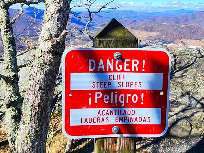 The sign says danger, the view says worth it, and somehow both things are completely true.