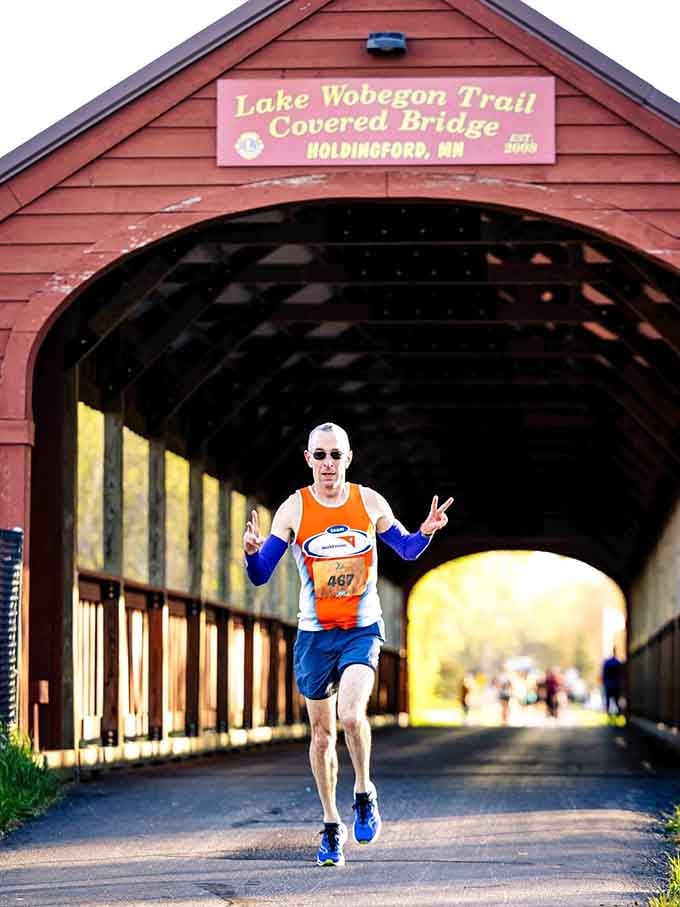 Racing through the longest covered bridge in Minnesota, with both hands up. That's a good day.