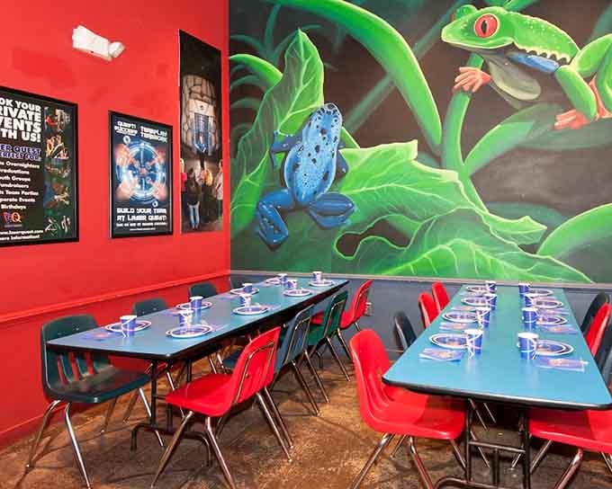 Vivid tropical frogs leaping across the mural while party tables sit neatly set below, this room brings the jungle to Newington.