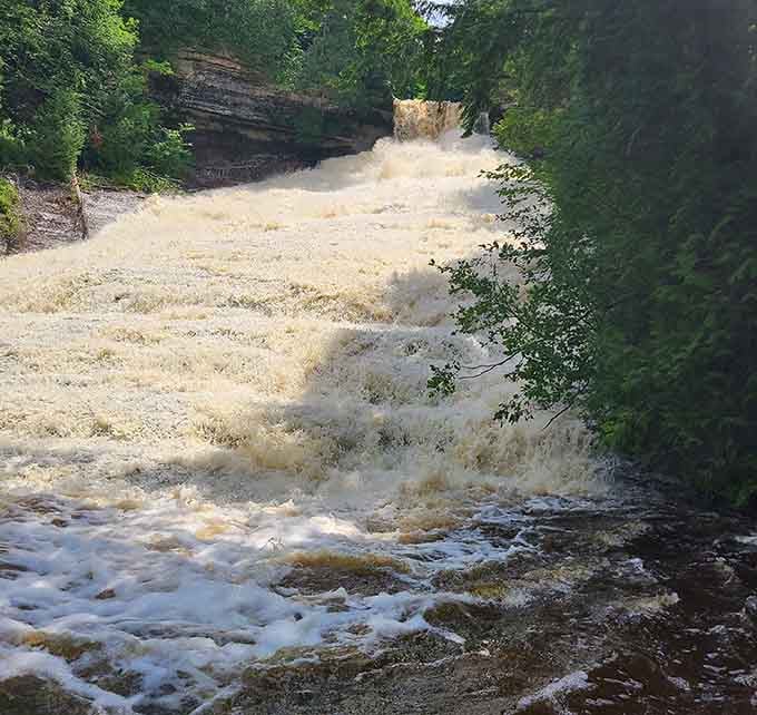 After heavy rain, the falls turn a rich caramel color and roar with enough energy to rattle your chest.