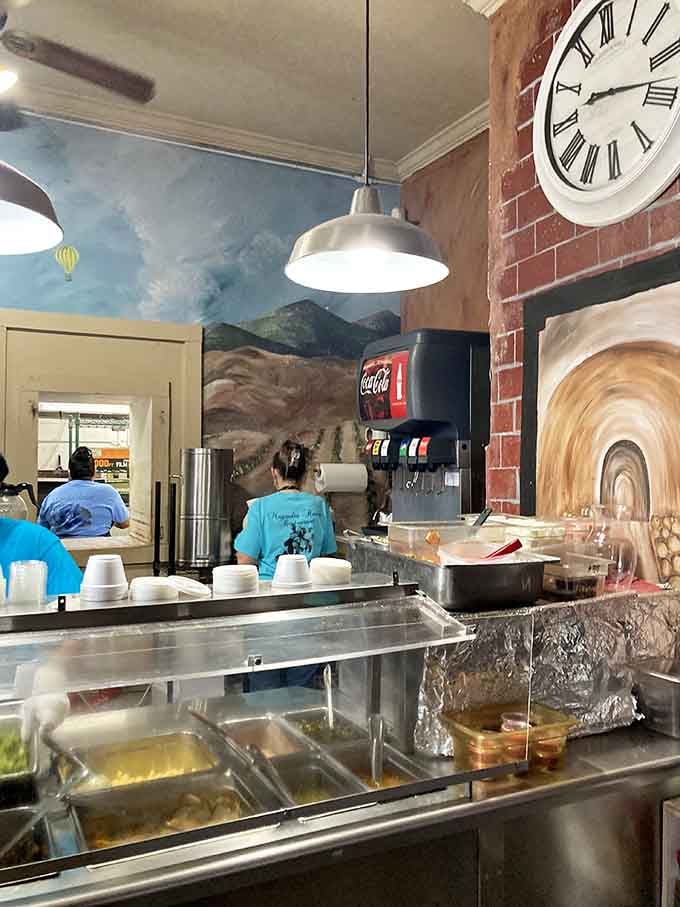 Hand-painted murals, a big clock on the wall, and a hot food bar ready to make your afternoon, this is the real deal.