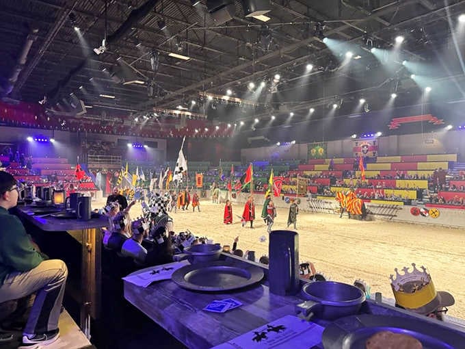 Flags flying, horses charging, hundreds of people cheering. This arena turns strangers into loyal subjects fast.