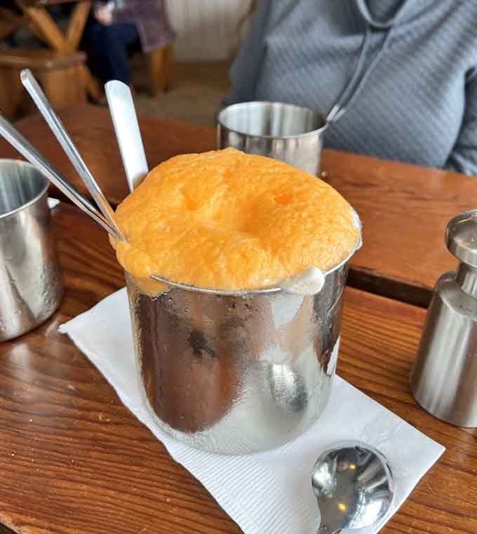 An old-fashioned ice cream float served in a metal cup tastes like summer in 1784.