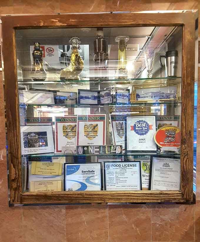 Multiple "Best of Main Line" awards packed into one display case, the hardware doesn't lie about this kitchen.