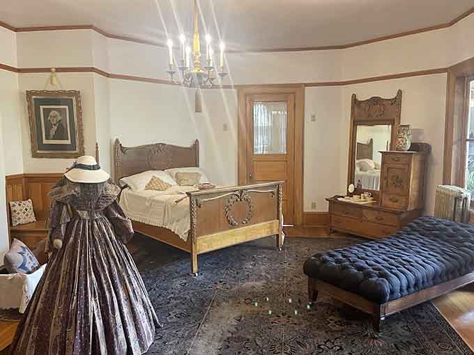 Carved wooden beds and candlelight ambiance that make modern hotel rooms feel deeply, profoundly ordinary by comparison.