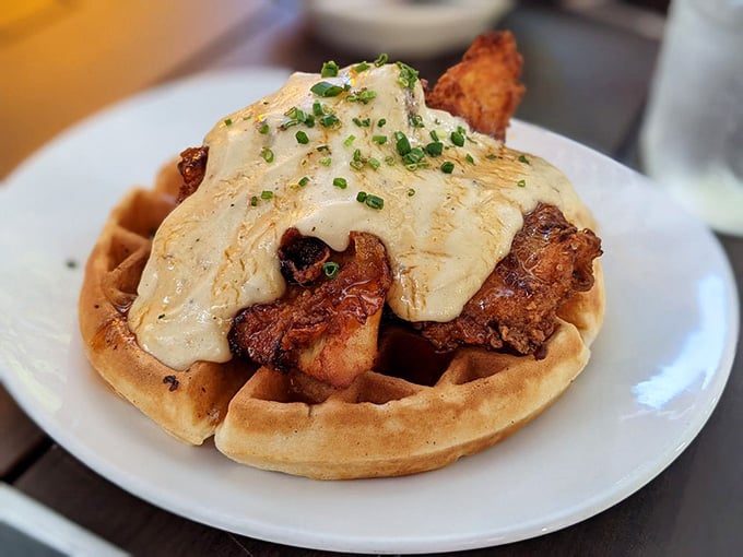 Crispy fried chicken, thick-cut bacon, and b&eacute;chamel sauce all piled onto a golden waffle. Brunch just raised the stakes considerably.
