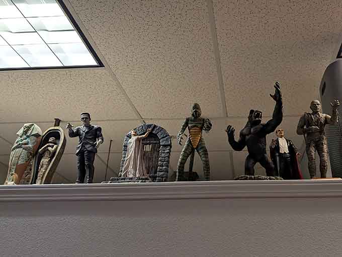 Action figures from cult classics line the shelves like tiny guardians watching over their cinematic kingdoms below.