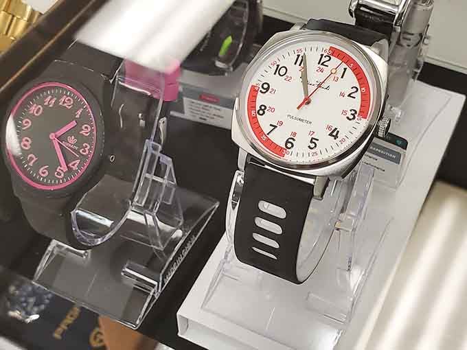 Two clean, classic watches displayed side by side, the kind of understated finds that make bin shopping feel genuinely rewarding.