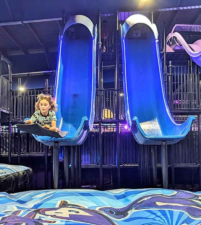 Those glowing blue drop slides look like something out of a sci-fi movie, and the landing is every bit as dramatic.