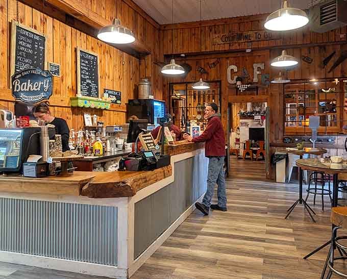 The order counter with its bakery sign and pendant lights feels more artisan cafe than roadside stop&mdash;and that's entirely the point.