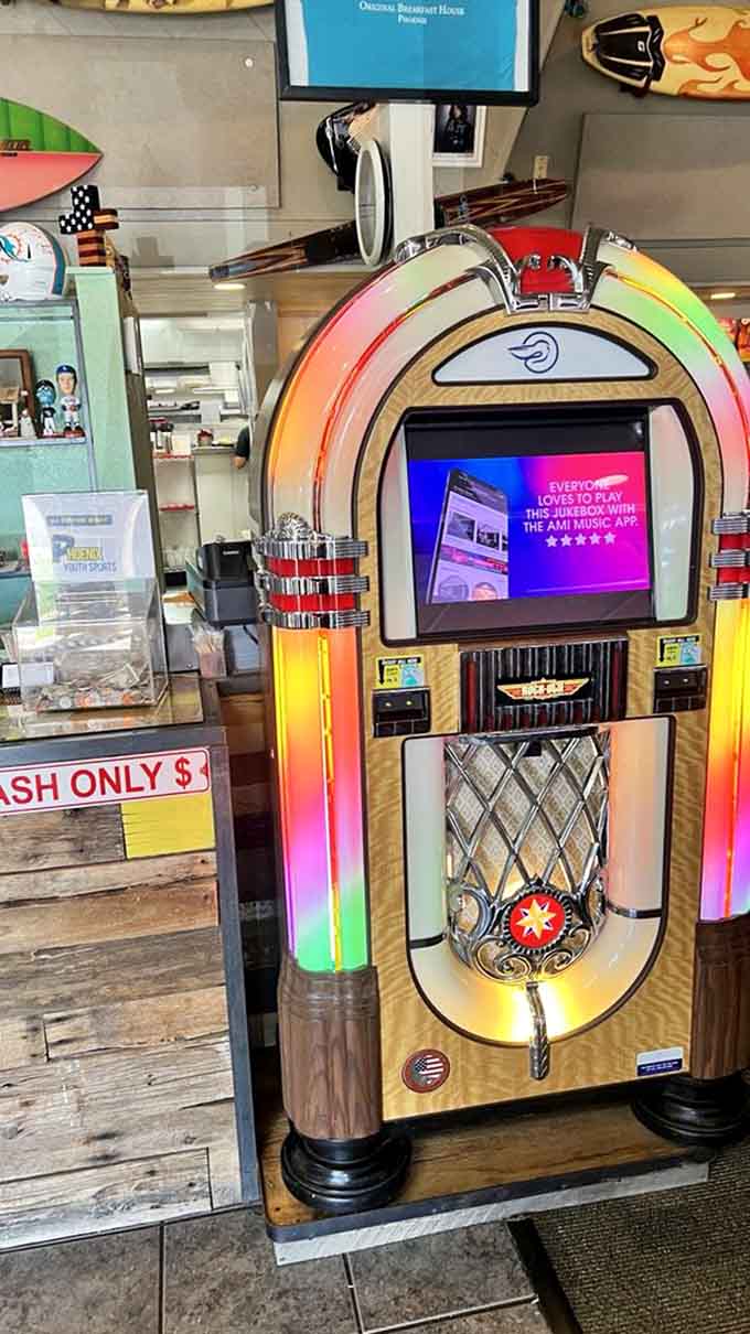 A classic jukebox stands ready to soundtrack your meal, because breakfast tastes better with a side of nostalgia.
