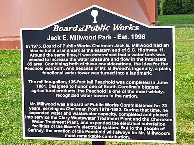 This historical marker tells the fascinating story of how a practical water tower became an unforgettable roadside legend.