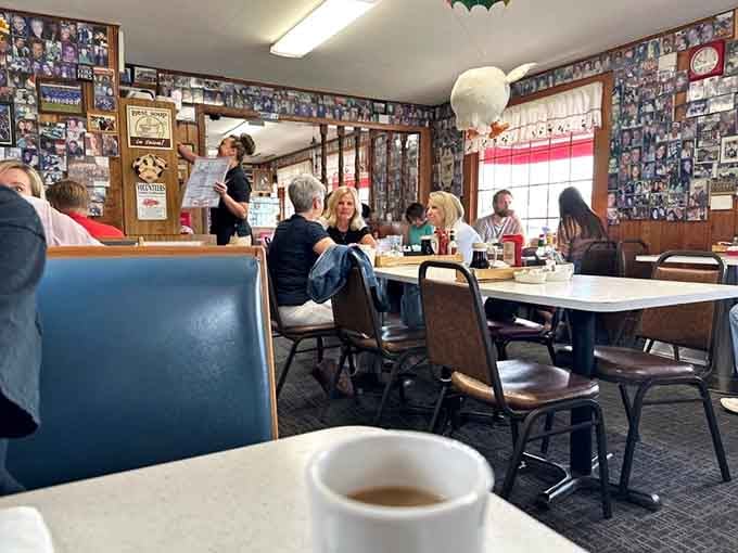 Cozy booth seating where conversations flow as easily as the coffee refills in this welcoming breakfast haven.