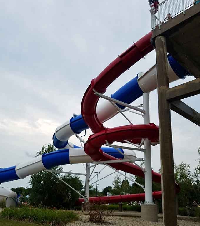 Red, white, and blue tubes twisting skyward. These outdoor slides at Pelican Harbor mean serious business.