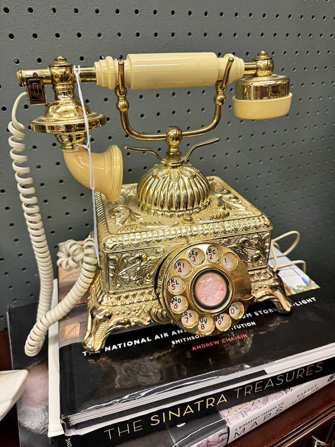 A gold rotary telephone so ornate, even royalty would pick up on the first ring.