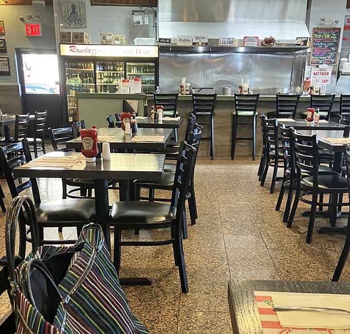 Open tables, Heinz bottles, and the Randazzo's sign glowing near the kitchen, this place has a comfortable, lived-in confidence about it.