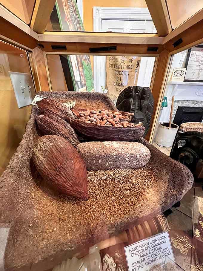 A hand-hewn lava rock grinding table similar to those used by ancient Mayans. Chocolate history runs deep.