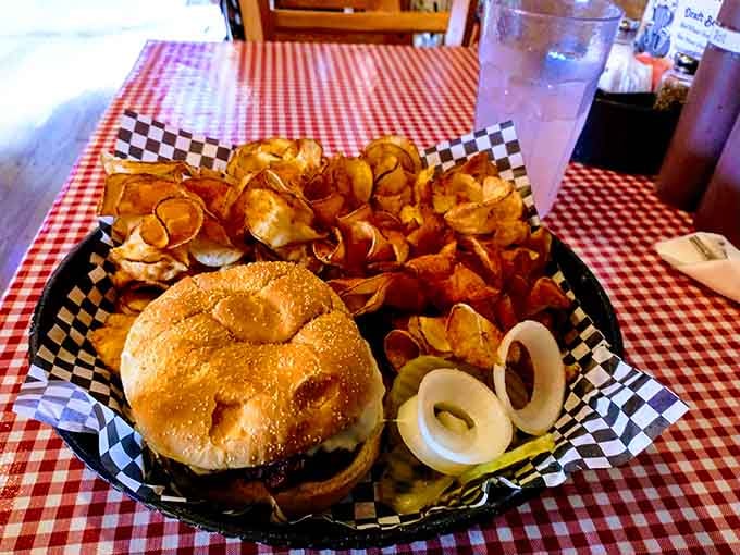 A burger paired with those gorgeous house chips, proof that sometimes the simplest combinations are the most satisfying ones.