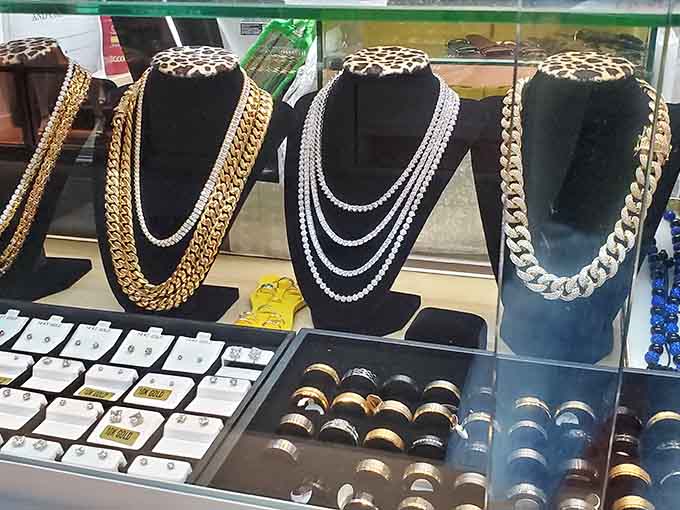 Chains gleam under display lights like affordable treasure, proving that looking fancy doesn't require actual precious metal investments.