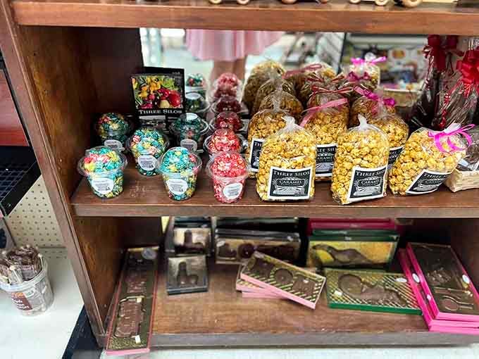Caramel popcorn bags tied with pink ribbons, the kind of snack that makes you feel fancy without even trying.