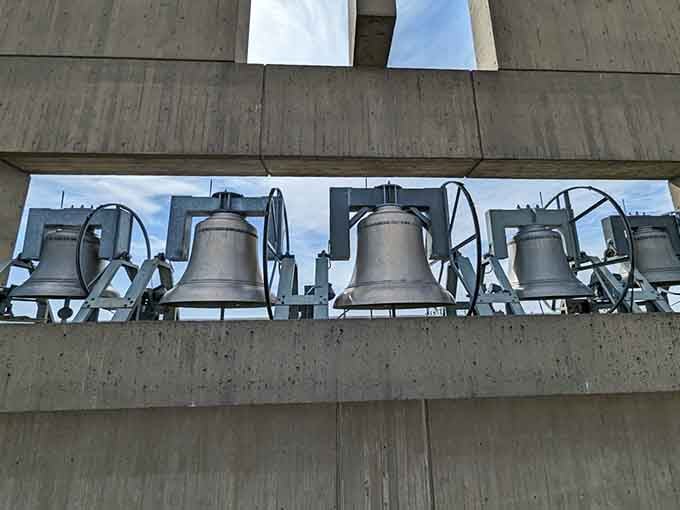 Five French bells hanging in a concrete tower, waiting to remind everyone within earshot that yes, beauty can be loud.