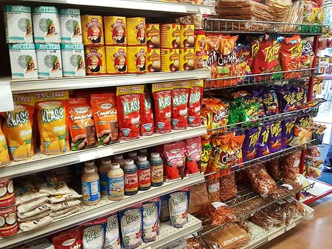 Klass drinks, Takis, churros, and more line these shelves. This is the snack aisle your childhood self always dreamed about finding.
