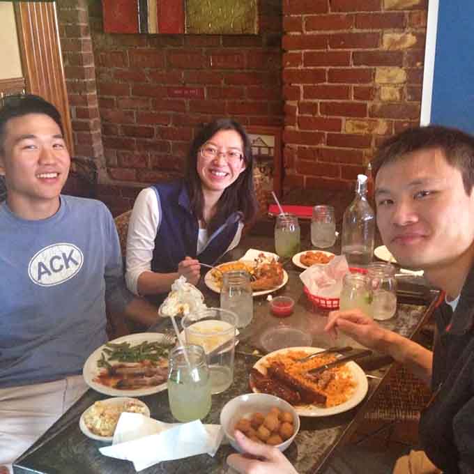 Happy diners sharing a meal together, proving that great food creates the best kind of memories.