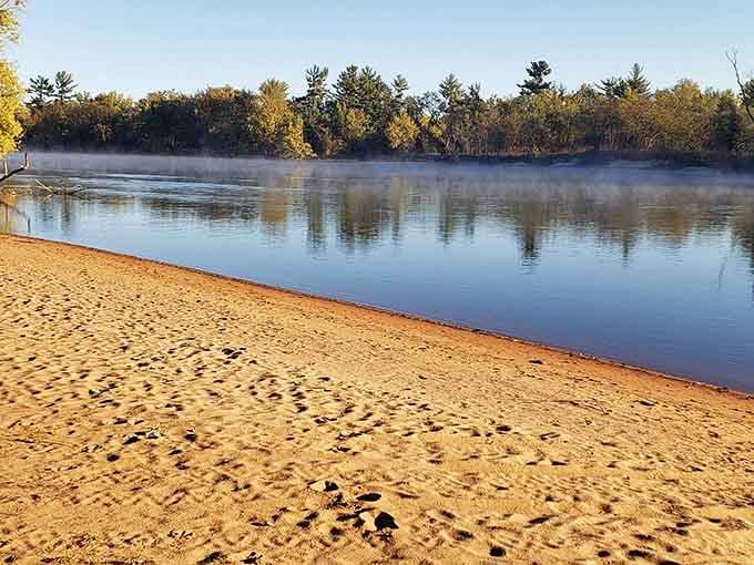 Early morning mist rising off golden sand. This river doesn't just flow, it puts on a show.
