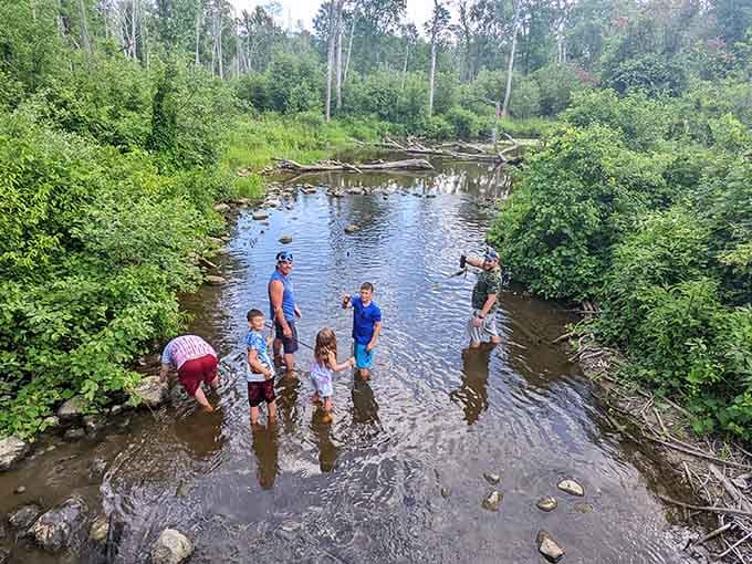 Wading in the river, no agenda, no Wi-Fi. This is what a good family day actually looks like.