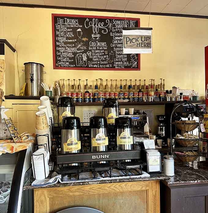A full coffee station with rows of flavored syrups, because your latte deserves options.