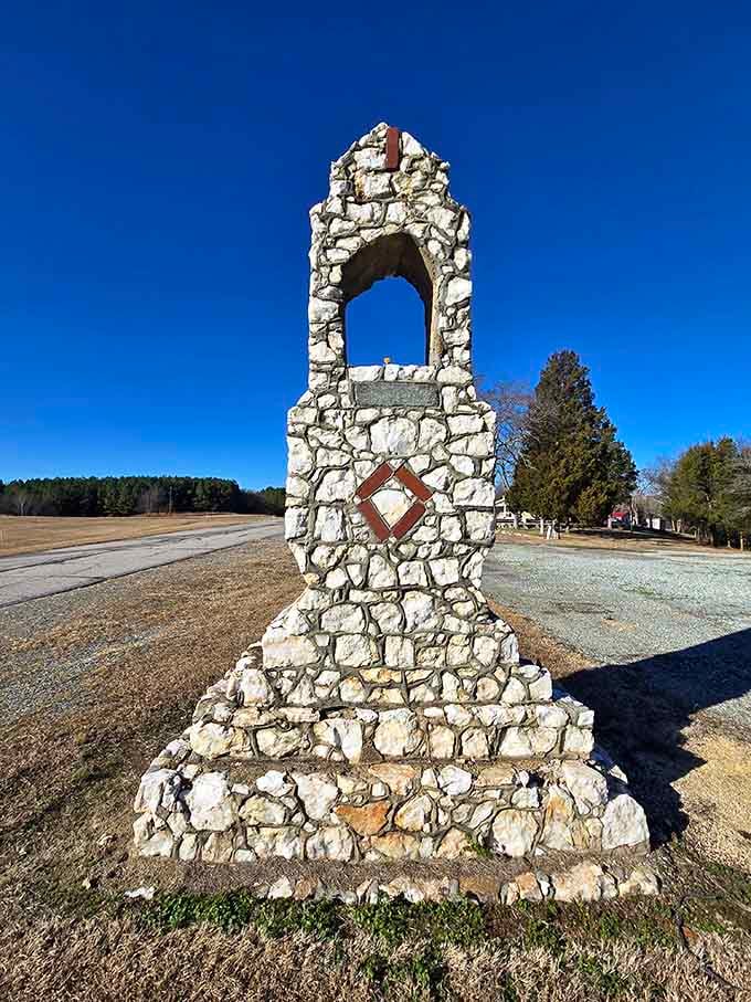 Standing tall against a brilliant blue sky, this stone monument looks like it belongs in a much larger city.