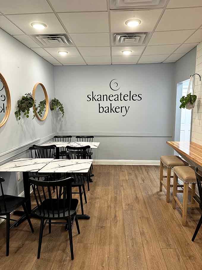 Marble tables, black chairs, hanging plants, and your name written in lowercase on the wall. Cozy doesn't cover it.