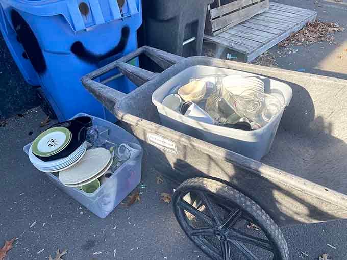 Plates, bowls, and assorted dishware loaded up and ready for their final performance. Every piece has one last great moment ahead.