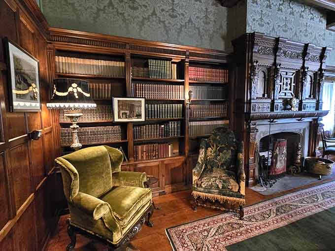The library at Stan Hywet, where the velvet chairs and crackling fireplace make leaving feel genuinely irresponsible.