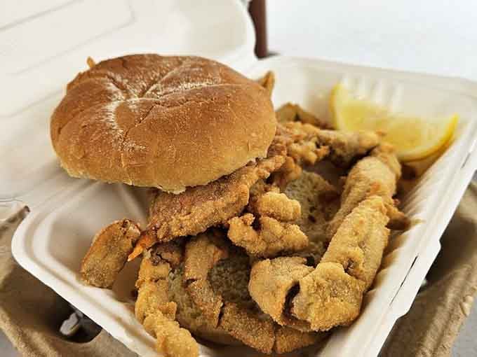 That soft shell crab sandwich, golden and overflowing from a toasted bun, is the kind of lunch that earns a standing ovation.