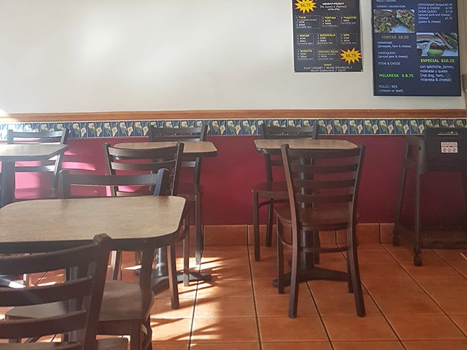 Another angle reveals more seating and that inviting atmosphere that keeps regulars coming back week after week.