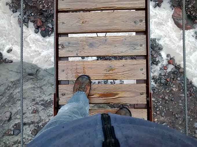 That moment when you look down and remember: yes, there's definitely water rushing beneath those wooden planks.